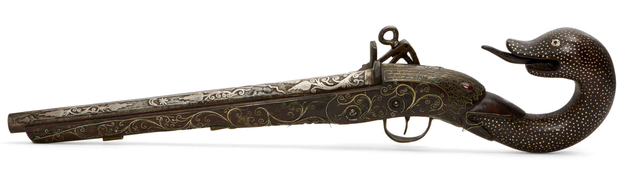 Roseberys London | An Ottoman silver wire inlaid pistol with snake and bird