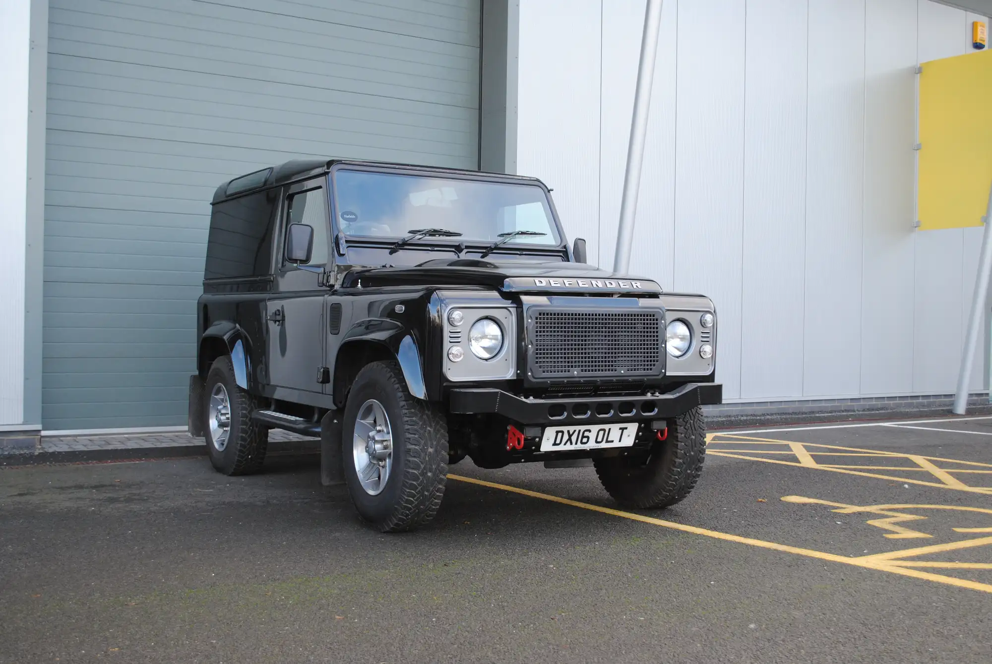 Iconic Auctioneers | 2016 Land Rover Defender 90XS Hard Top-Sold