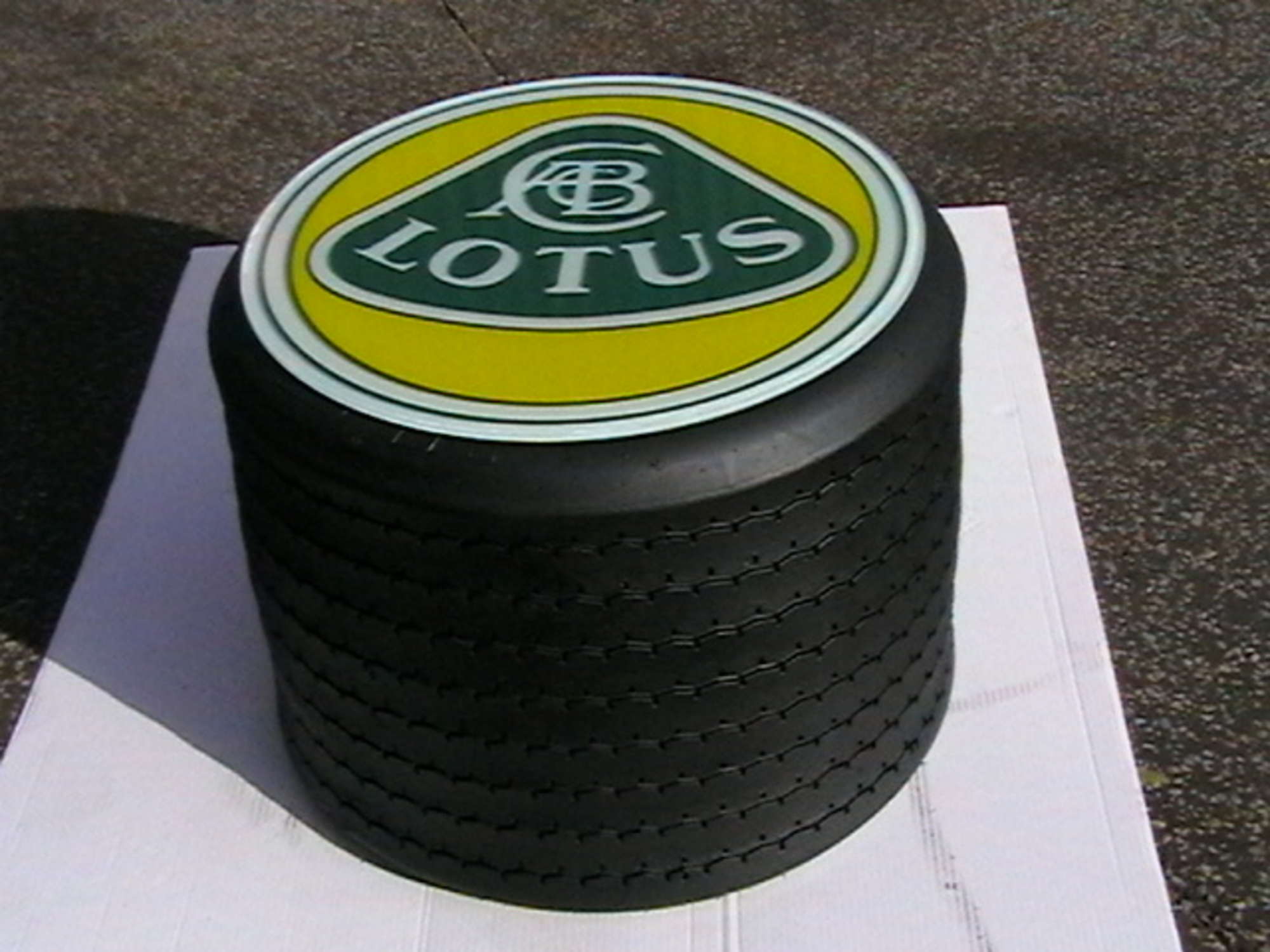 Iconic Auctioneers | Lotus F1 rear wheel coffee tablel.-Sold