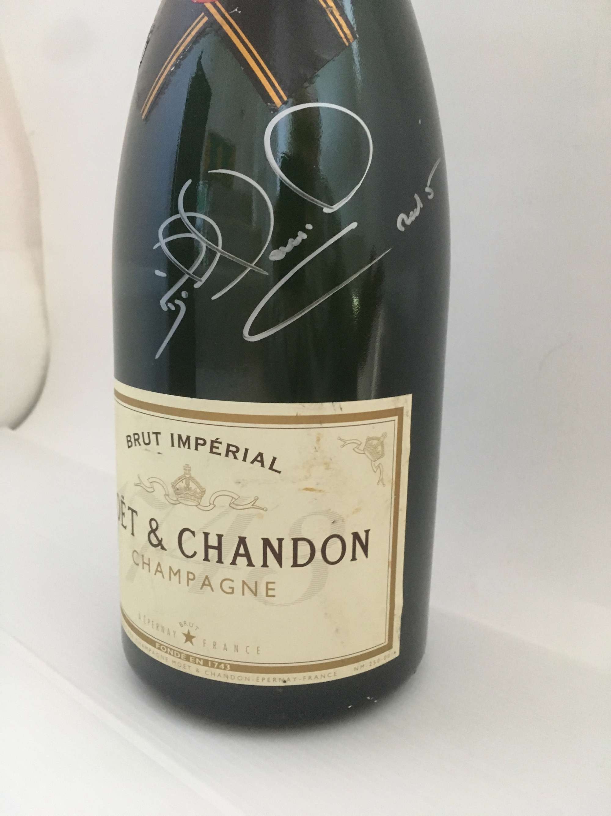Iconic Auctioneers | Champagne presentation bottle, signed Nigel ...