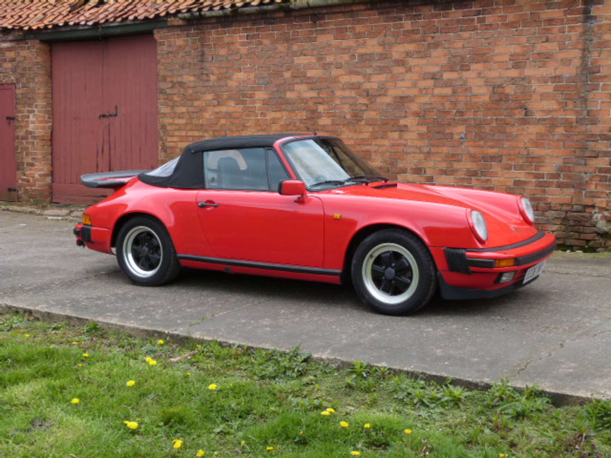 Iconic Auctioneers | 1985 Porsche 3.2 Carrera Cabriolet-Sold
