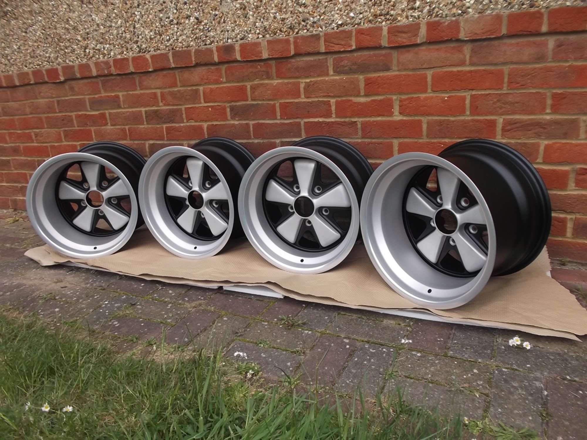 Iconic Auctioneers | A set of Porsche 911 Fuchs wheels.-Auction Lot